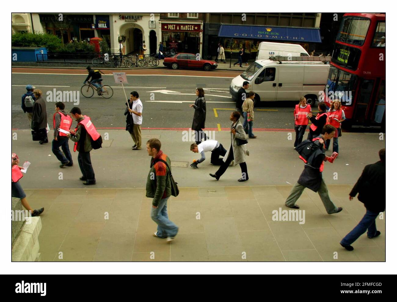 Myles Anderson rolled an orange one mile through the city of London in ...