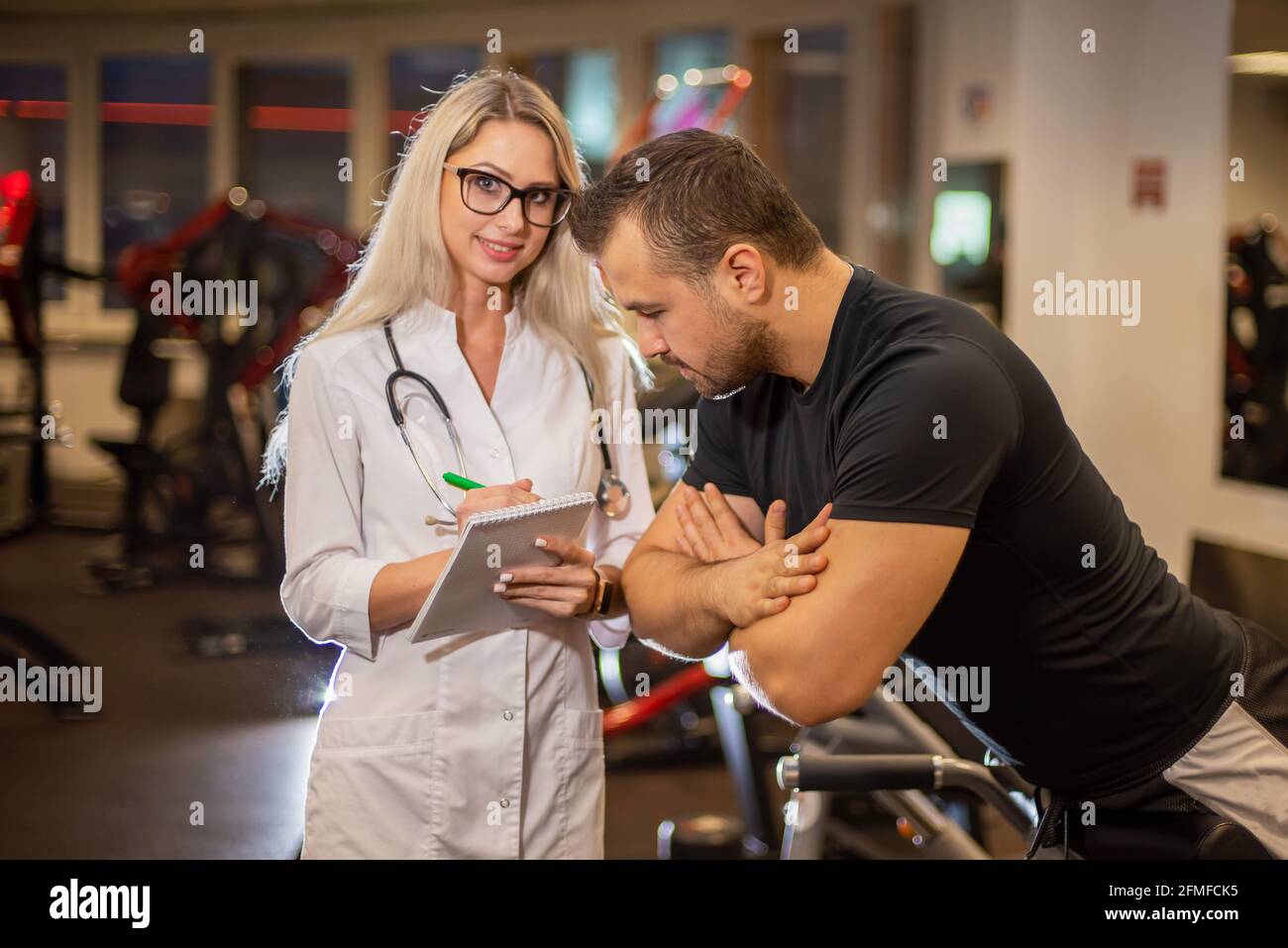 Medical examination. heart rate The doctor measures the pulse during a ...