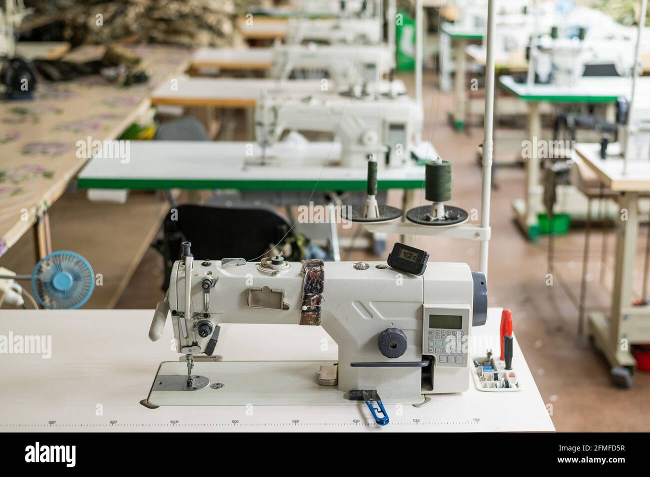 Interior of a workshop for sewing clothes and textiles. Without people ...