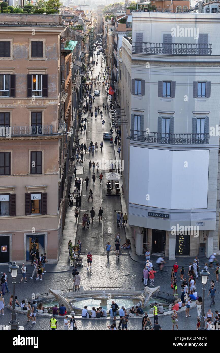 Italy, Rome, people on Piazza di Spagna and Via dei Condotti street ...