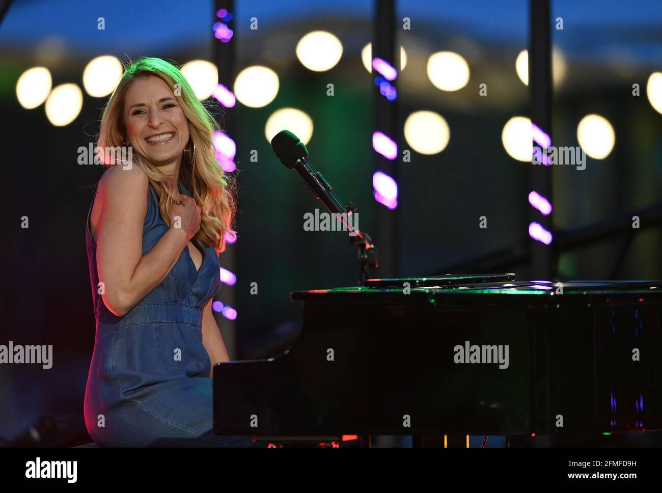 Leipzig, Germany. 08th May, 2021. German singer Stefanie Hertel sits on ...