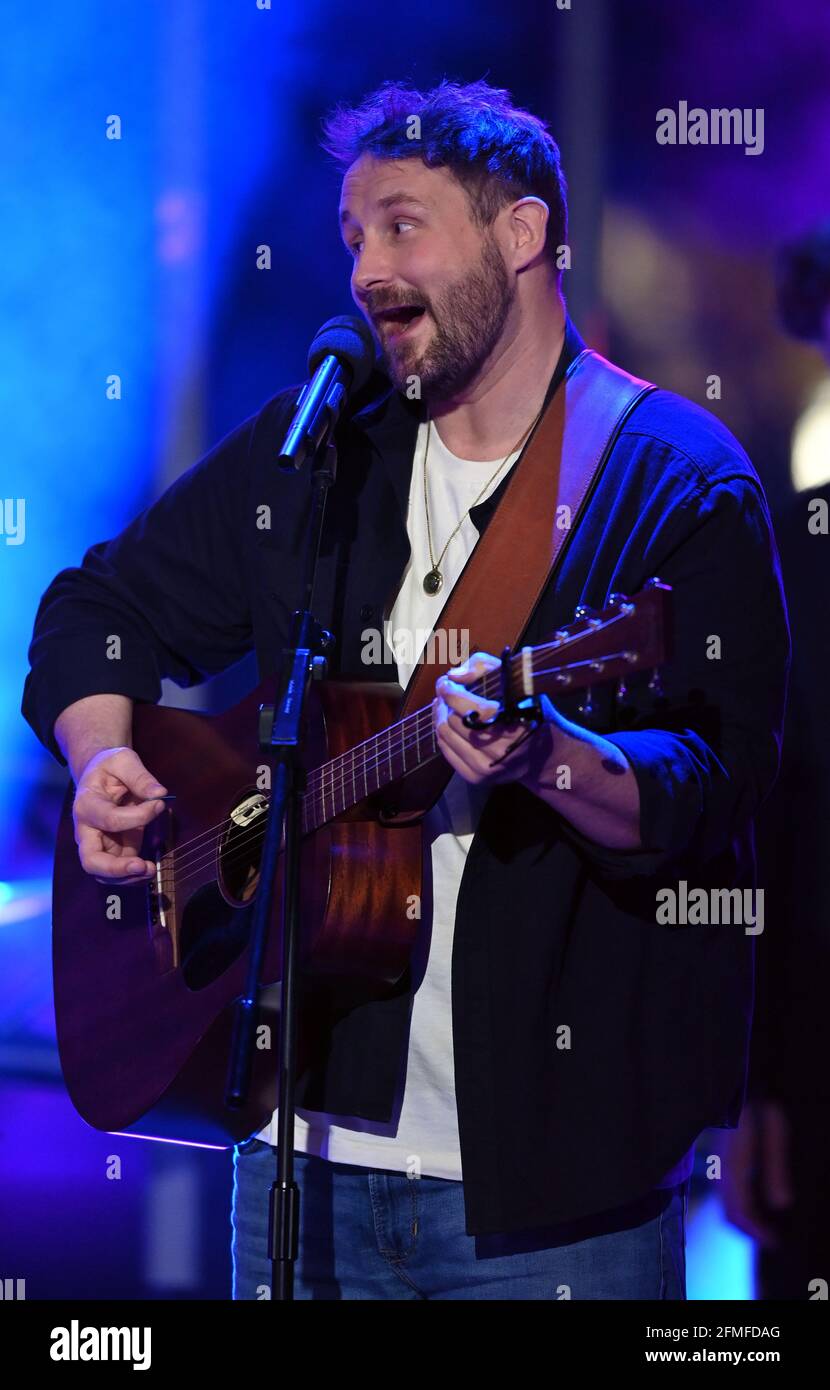 Leipzig, Germany. 08th May, 2021. Singer-songwriter Florian Künstler takes to the stage in ...
