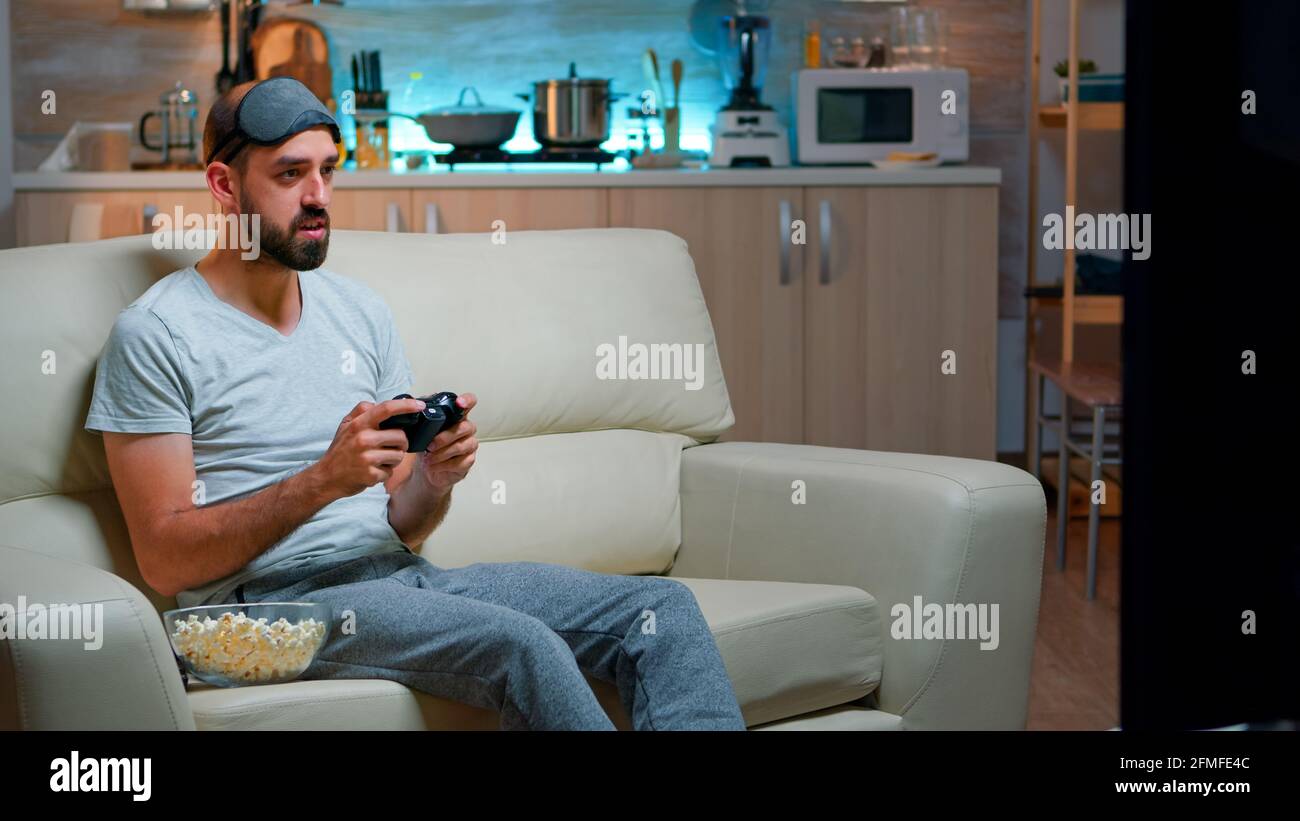 Frustrated pro gamer losing entertainment gaming competition using ...