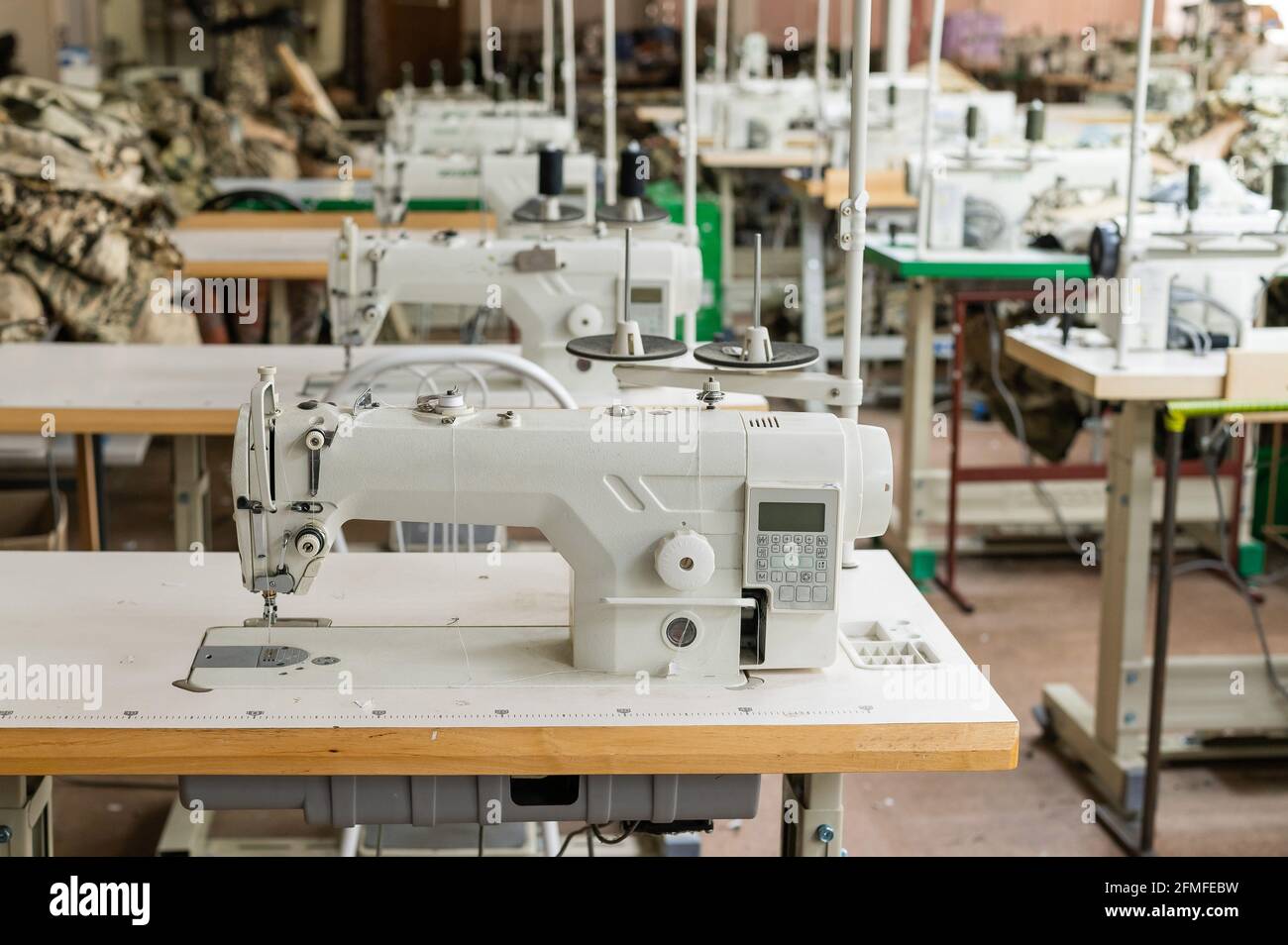 Interior of a workshop for sewing clothes and textiles. Without people ...