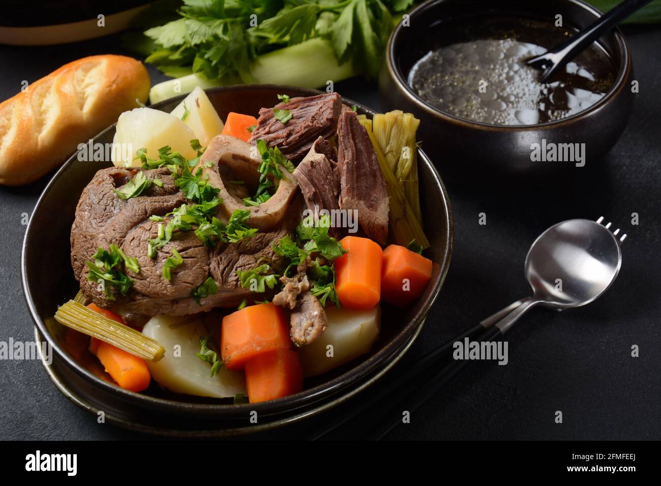 Pot-au-feu, traditional french stew. Stewed beef and potatoes. In ...