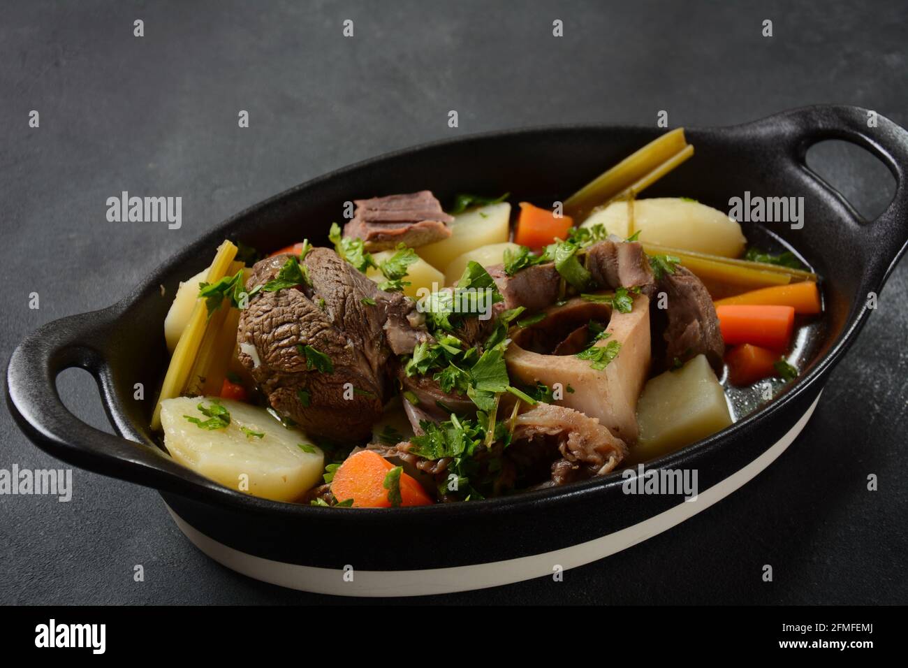 Pot-au-feu, traditional french stew. Stewed beef and potatoes. In ...