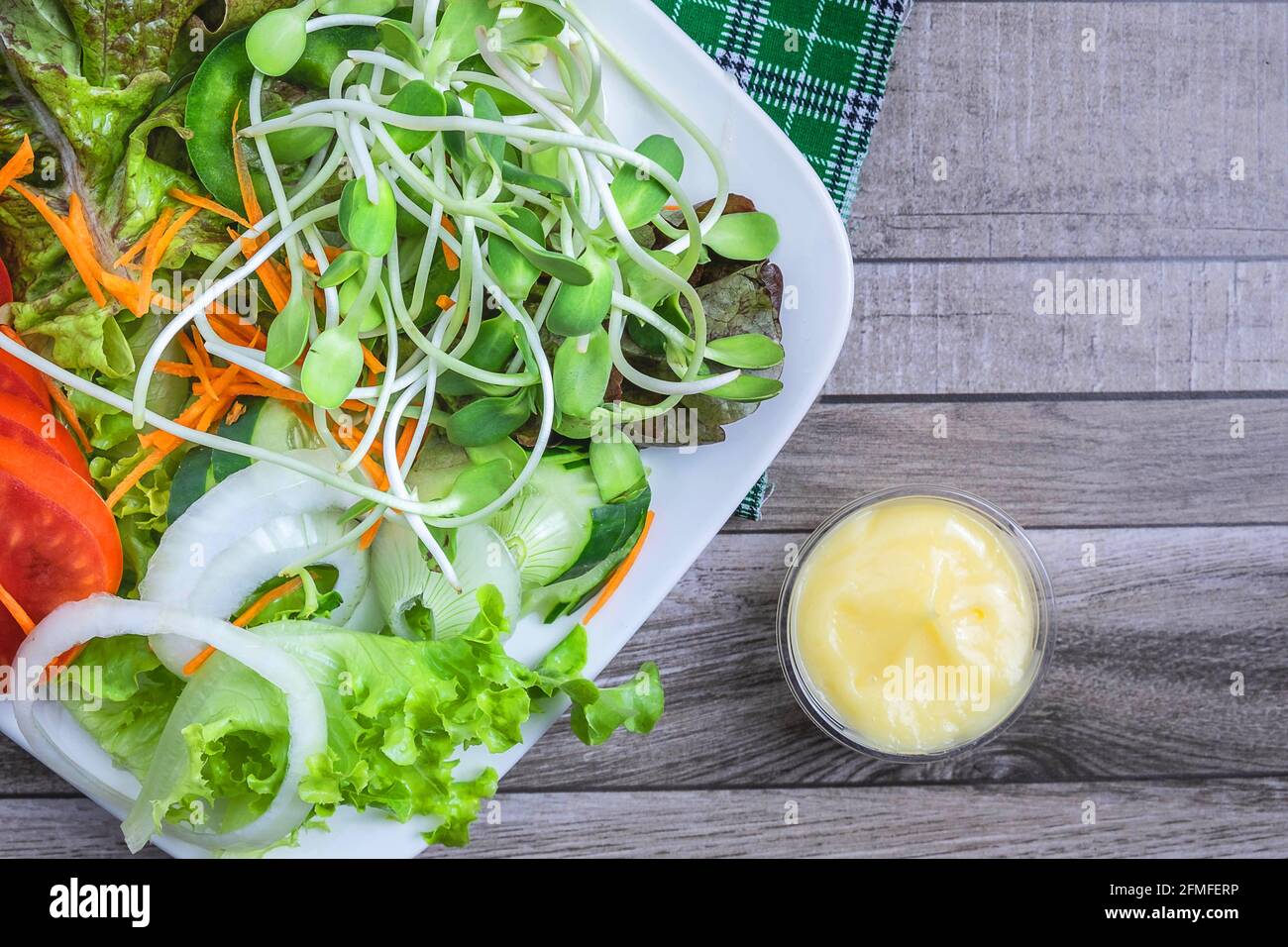 Fresh salad and tomato. Top view Stock Photo - Alamy