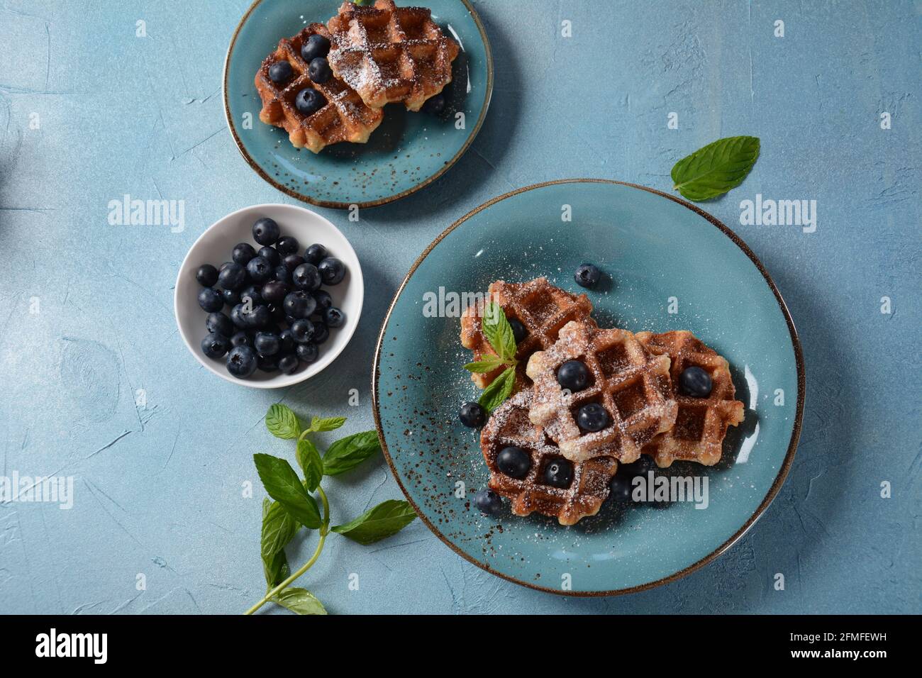 Traditional belgian waffles with fresh fruit or american waffles ...