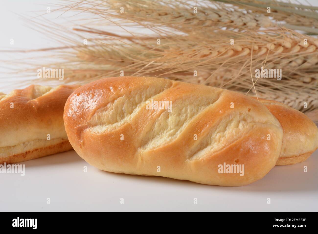 French baguette. Fresh mini baguettes with crispy Golden crust Stock ...