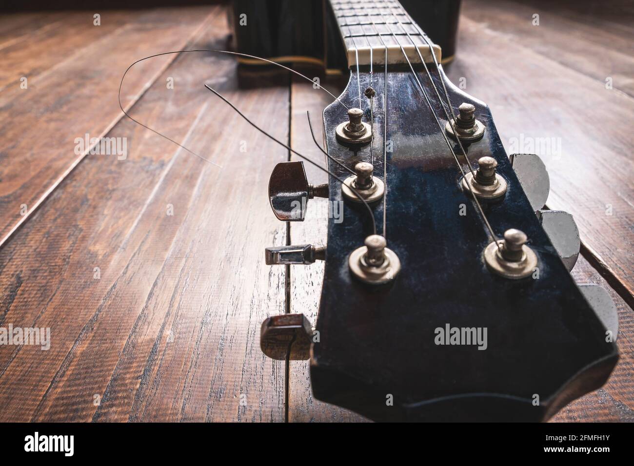 Acoustic guitar instrument on the table Stock Photo - Alamy