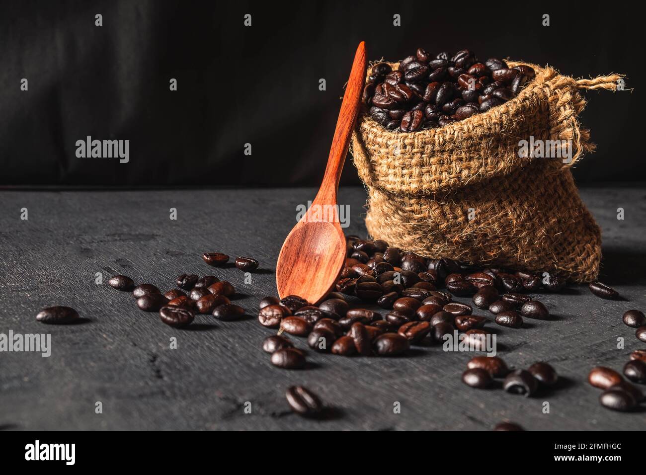 Raw coffee beans in a sack bag Stock Photo - Alamy