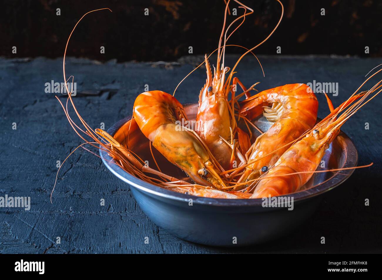 Seafood shrimp menu in a plate on a white table Stock Photo - Alamy