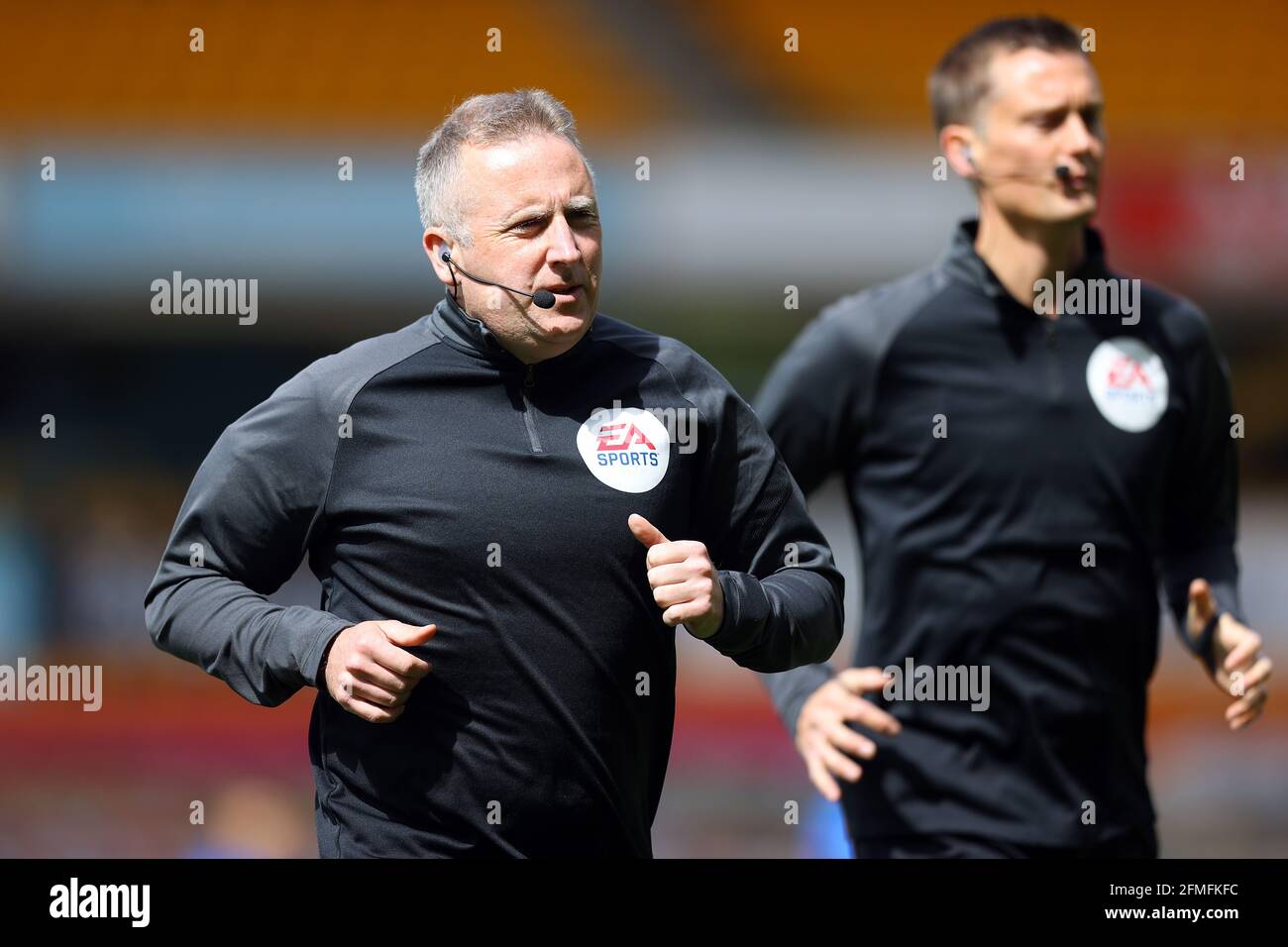 Referee Jon Moss warms up before the Premier League match at Molineux ...