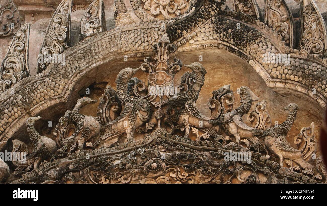 On the arch frame, there are a row of swans on the gate of Wat Phra ...