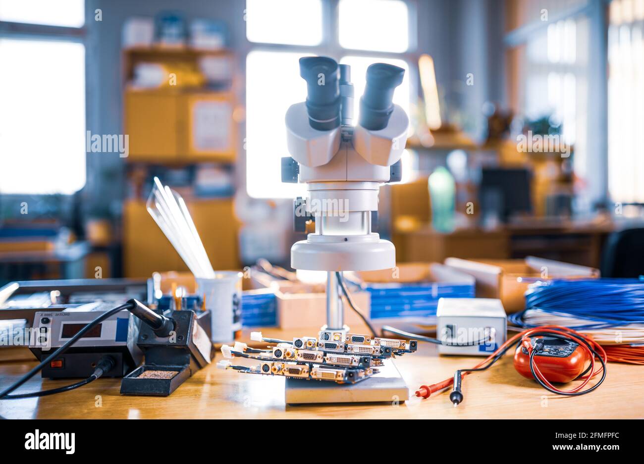 Modern microscope, electronic components in a scientific laboratory ...