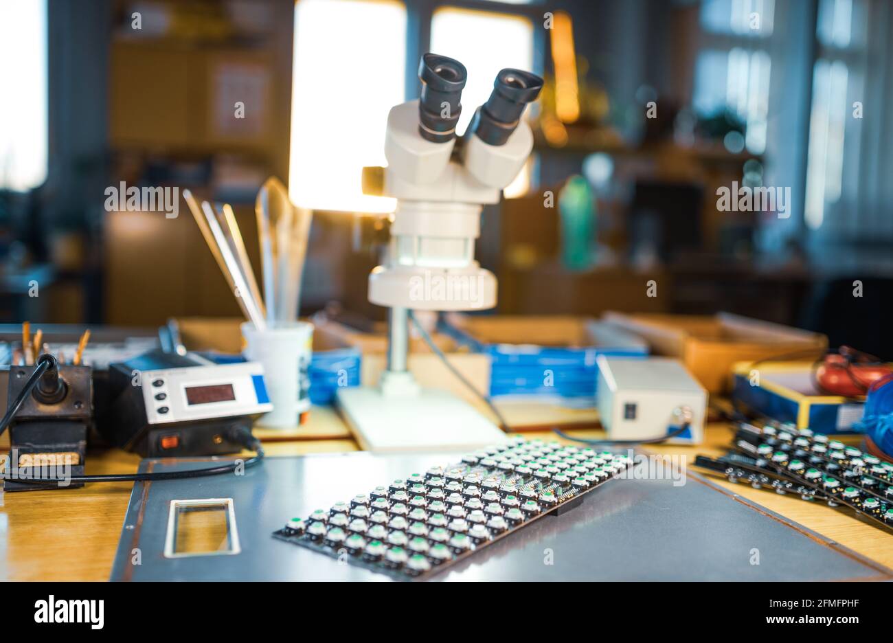 Modern microscope, Panel of LED light indicators is in the production ...