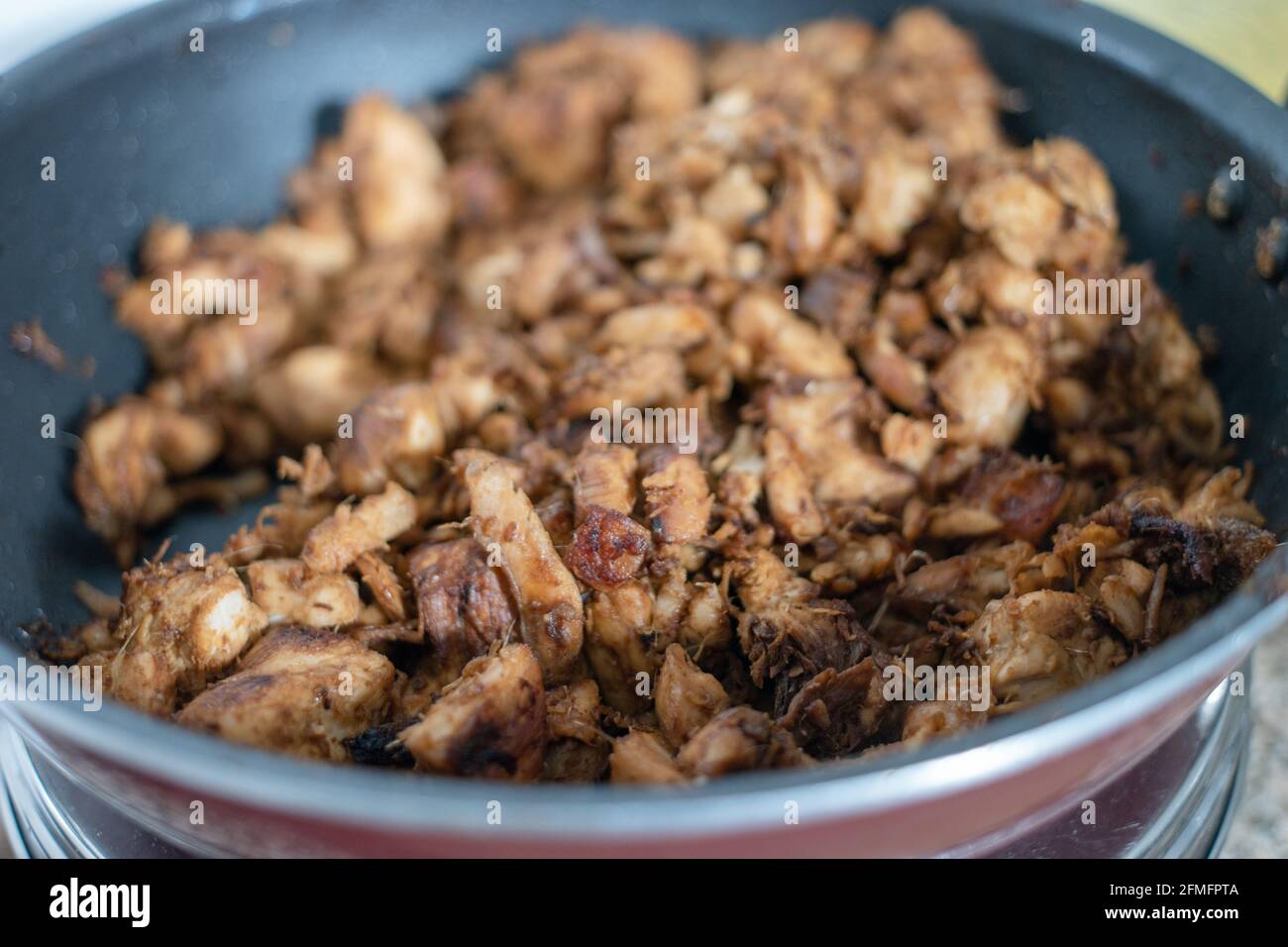 Fried meat in a pa Stock Photo - Alamy