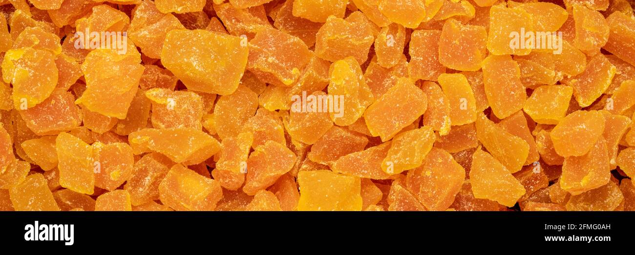 background and texture of dried mango fruit diced, panoramic web banner ...