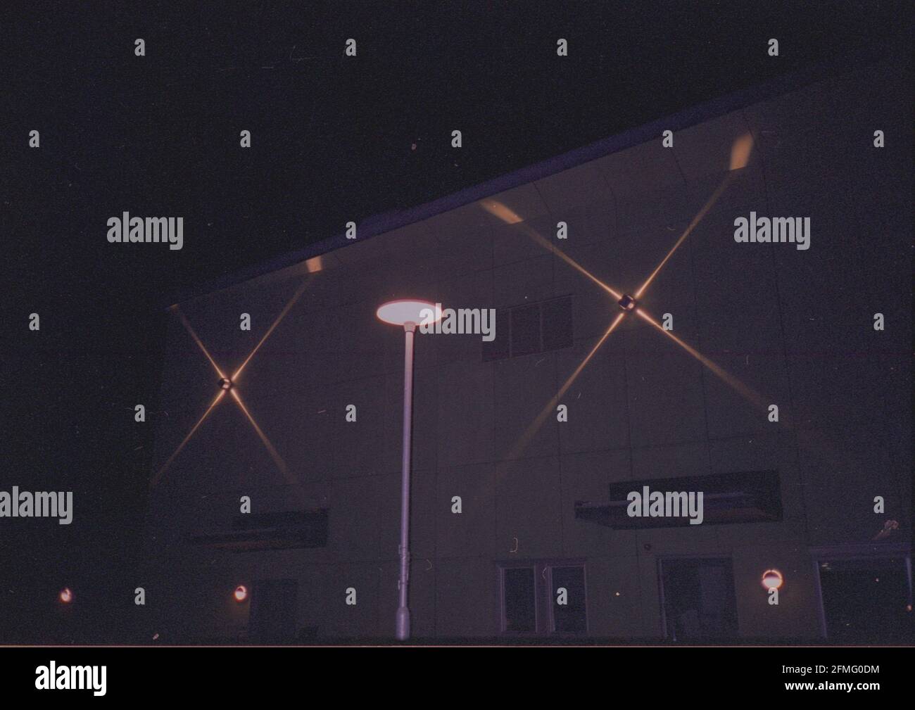 Night shot featuring a singular light fixture or a lamp Stock Photo - Alamy