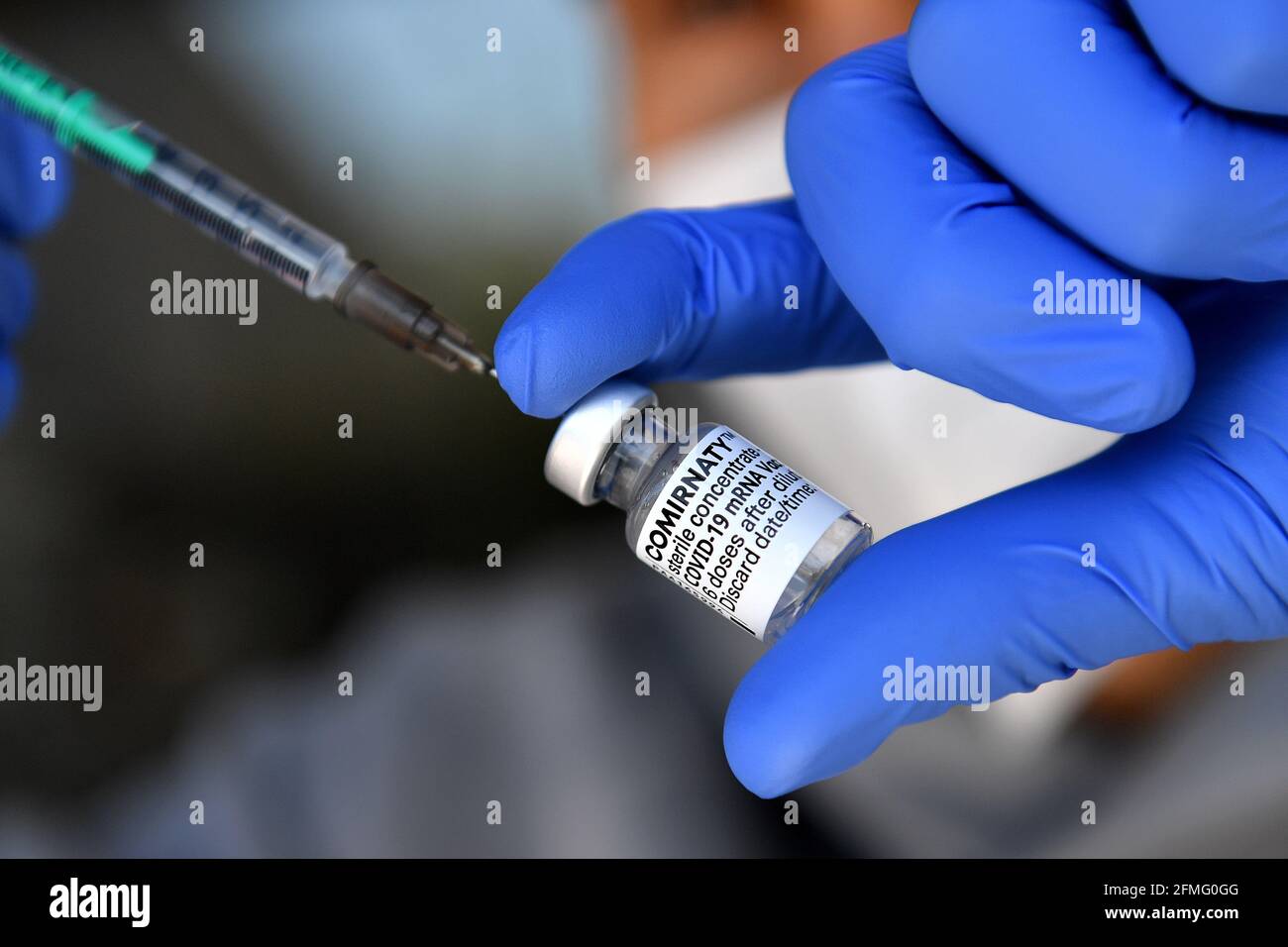 Topic picture -Comirnaty mRNA vaccine from BionTech Pfizer. Vaccine jar ...