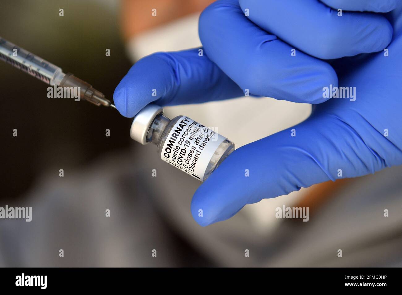 Topic picture -Comirnaty mRNA vaccine from BionTech Pfizer. Vaccine jar ...