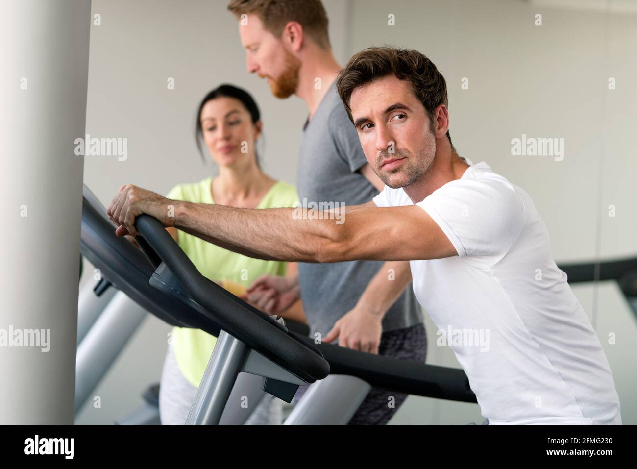 Cardio machine, bike, fit woman hi-res stock photography and images - Alamy