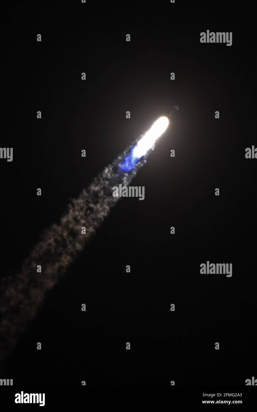 A SpaceX Falcon 9 rocket launches a payload of Starlink satellites at 2 ...