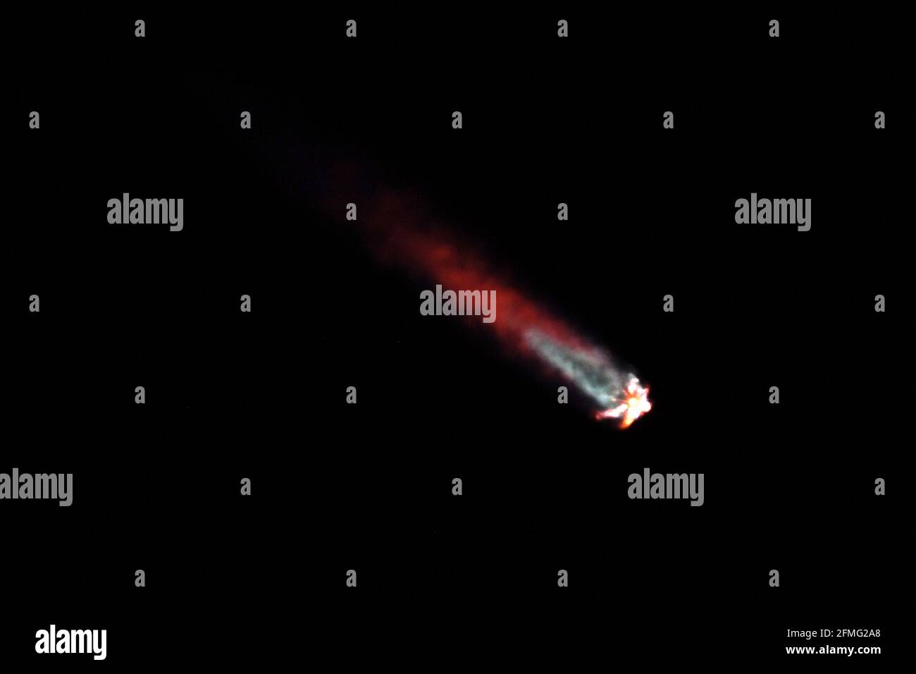 A SpaceX Falcon 9 rocket launches a payload of Starlink satellites at 2 ...