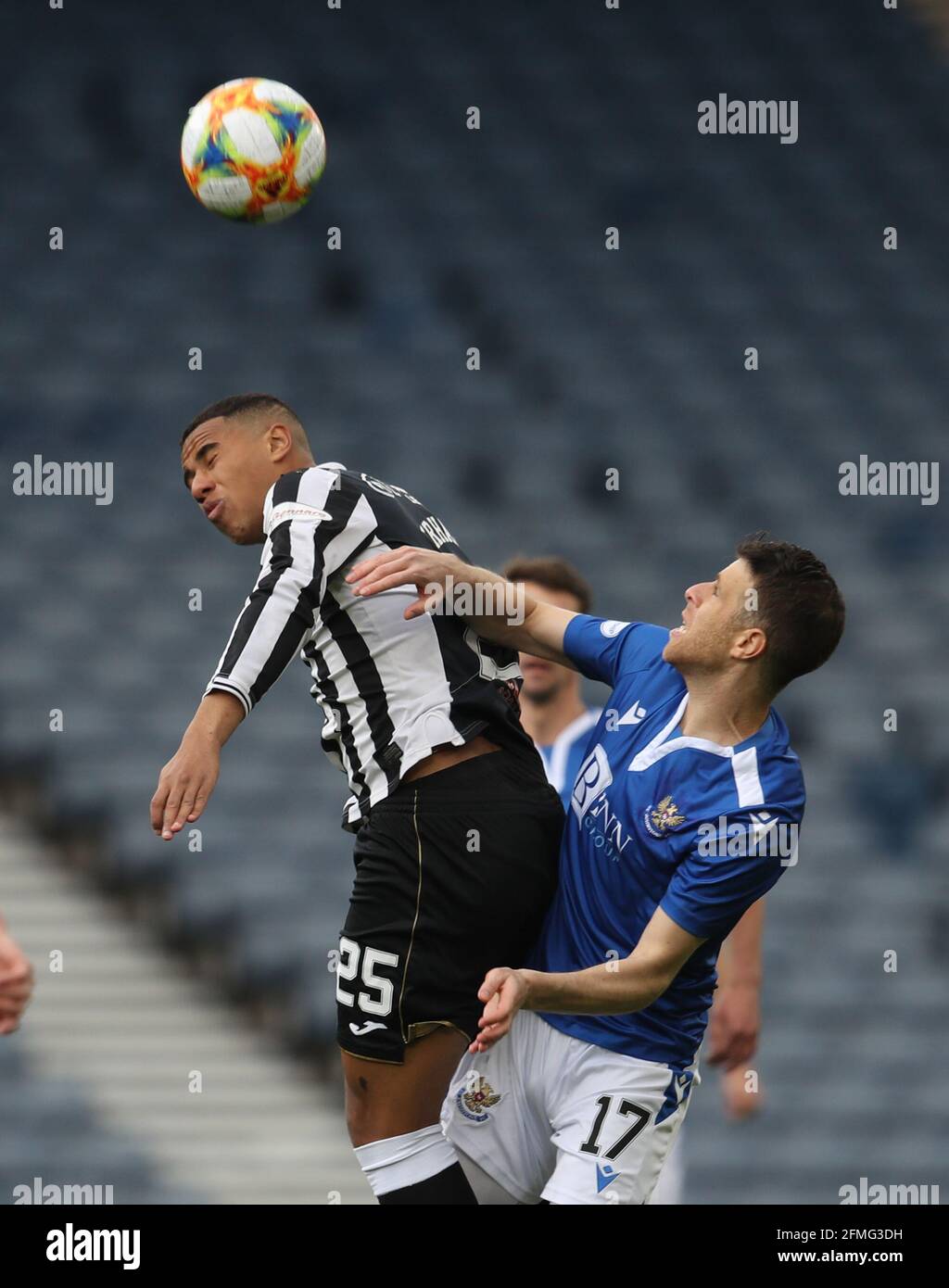 St Mirren's Ethan Erhahon (left) and St Johnstone's Guy Melamed battle ...