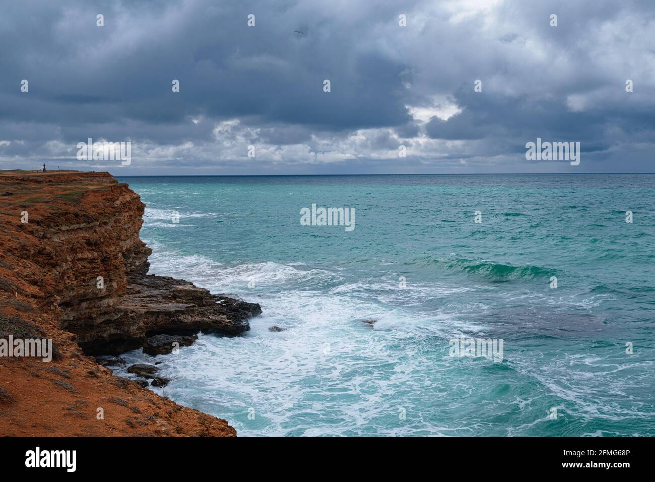 Beautiful view of ocean waves and a fantastic rocky shore, Sea patterns ...