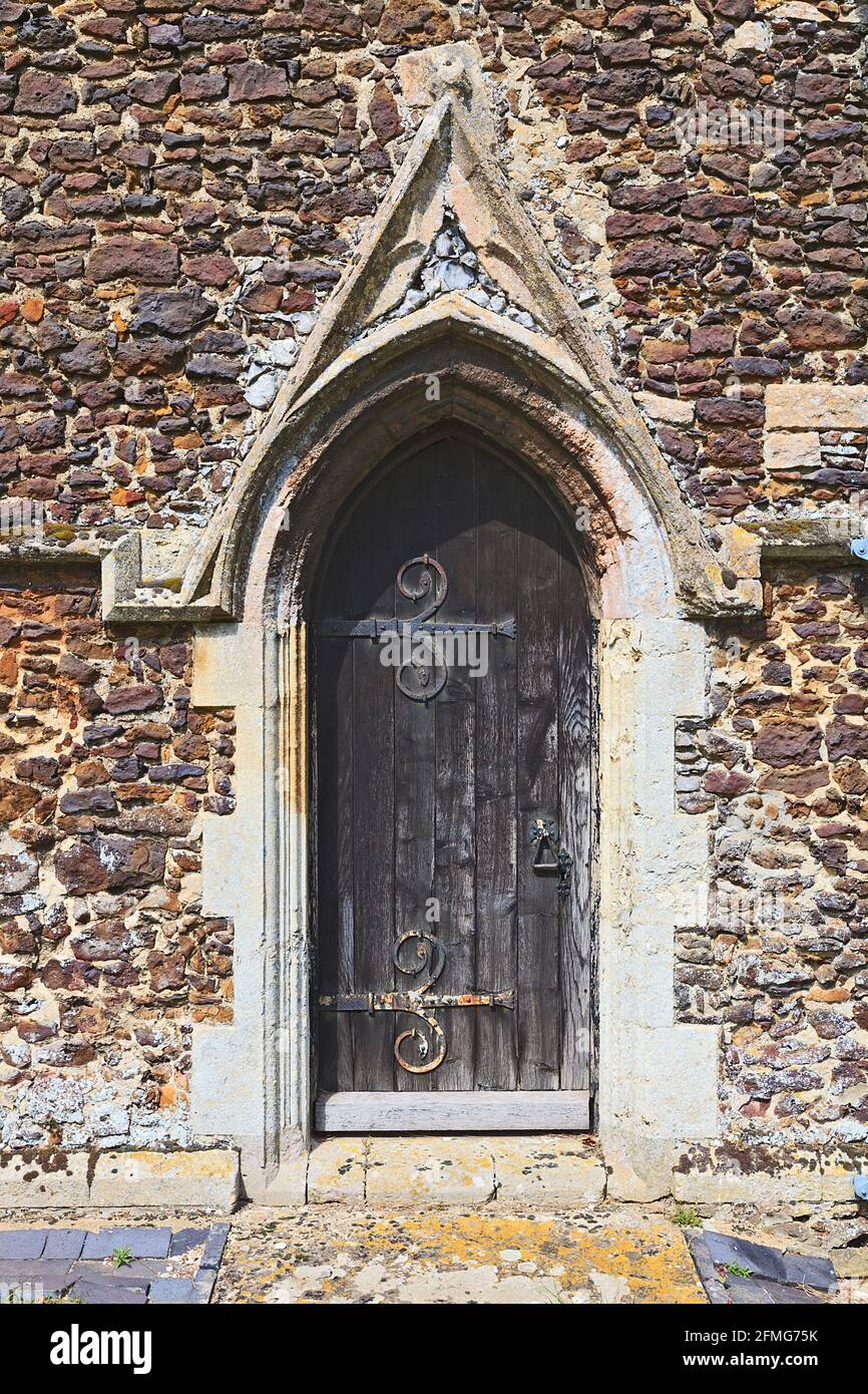Wooden door in the side of the 13th century St Peter's Church ...