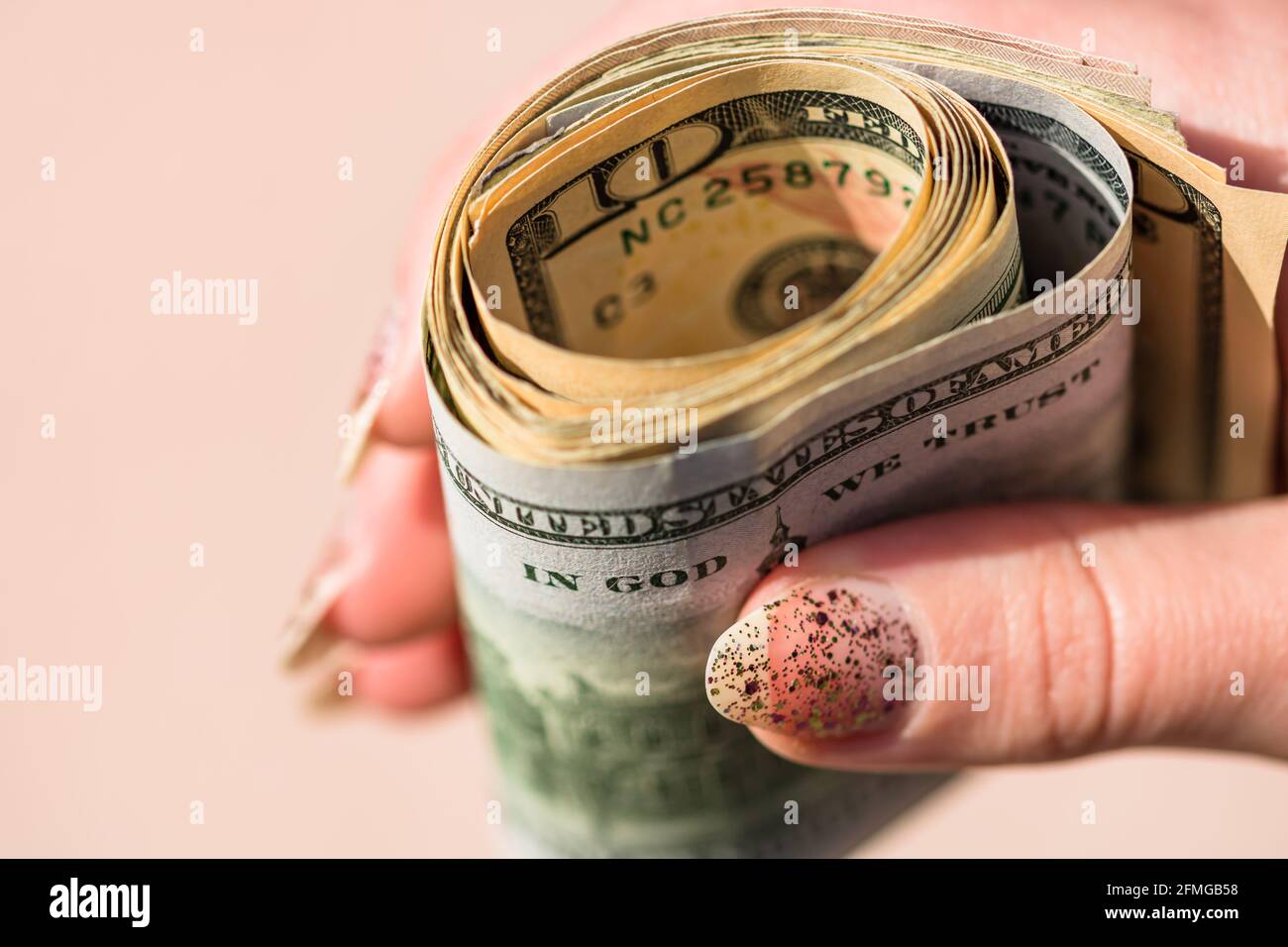 Selective focus on detail of USD banknotes. Counting or giving United ...