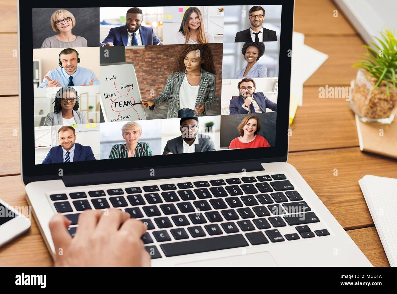 Closeup Of Laptop With Group Video Call Of Business People Stock Photo ...