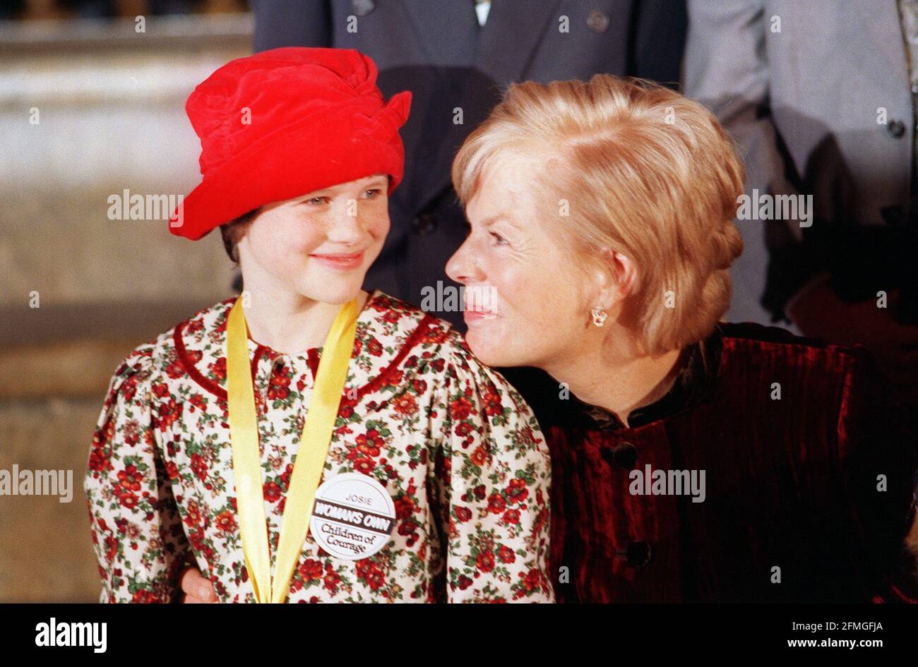 The Duchess of Kent cuddles Josie Russell in Westminster Cathedral ...