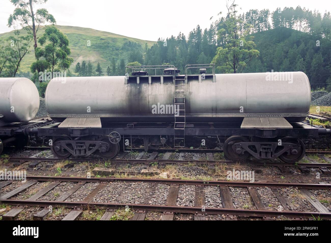 Set of tanks with oil and fuel transport by rail. Freight cars and ...