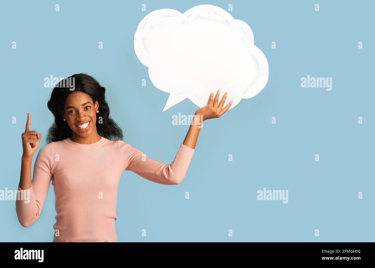 Idea Concept. Excited Black Woman Holding Speech Bubble And Pointing ...