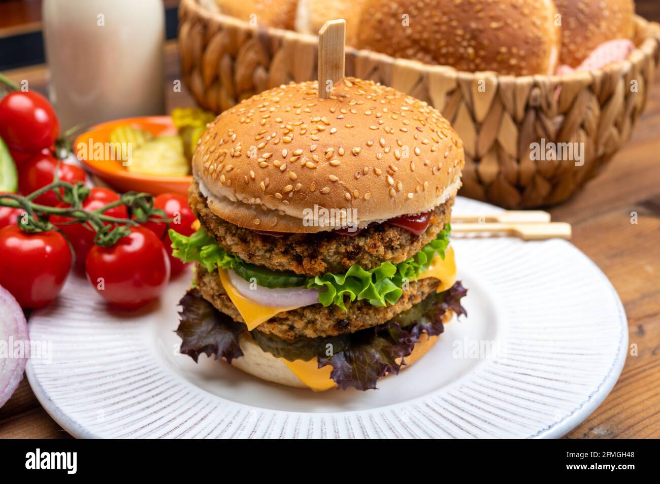 Tasty vegetarian cheeseburgers with round patties or burgers made from ...