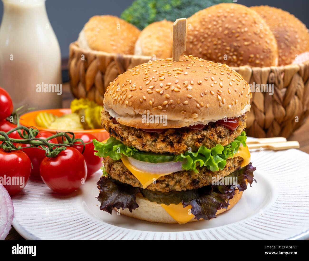 Tasty vegetarian cheeseburgers with round patties or burgers made from ...