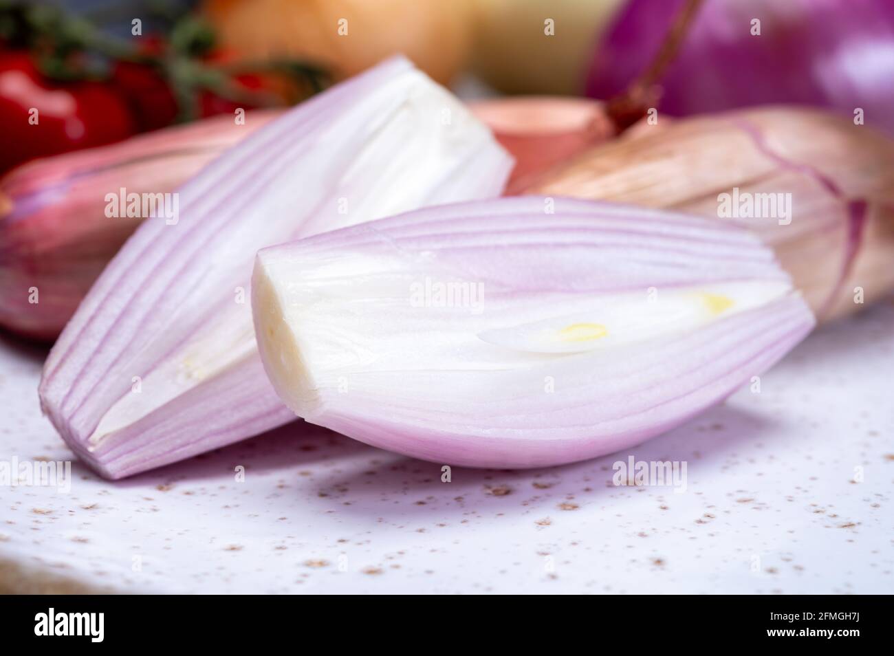 Onion collection, pink French shallot onlons close up Stock Photo - Alamy