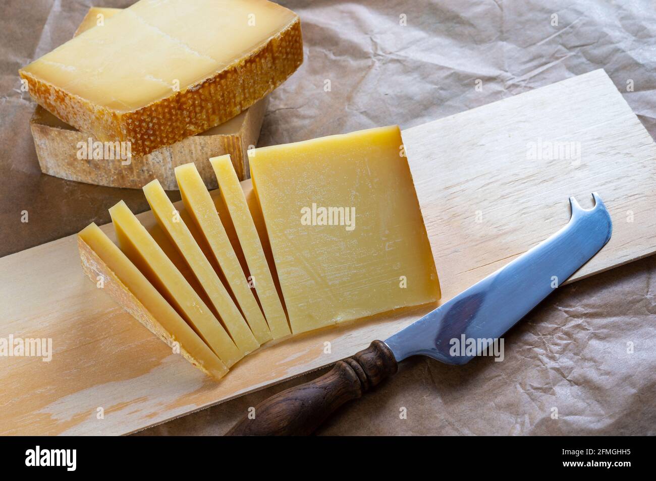 Cheese collection, French comte and Swiss gruyere cheeses close up ...