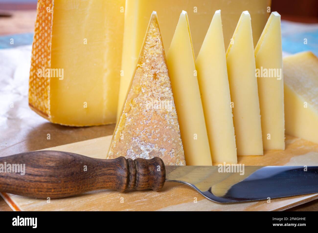 Cheese collection, French comte and Swiss gruyere cheeses close up ...