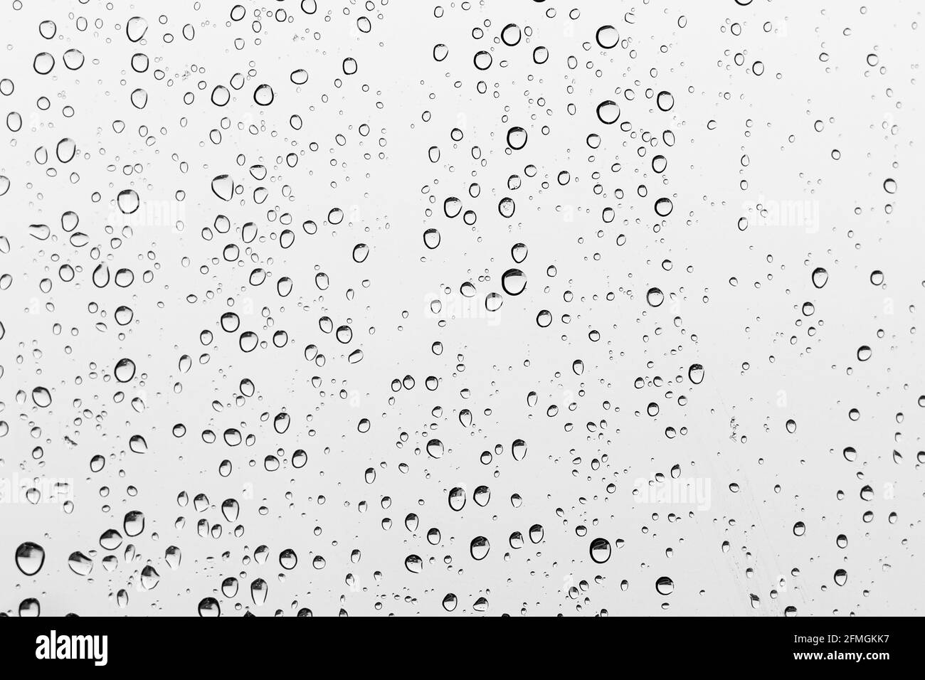 Water drops on transparent gray glass Stock Photo - Alamy
