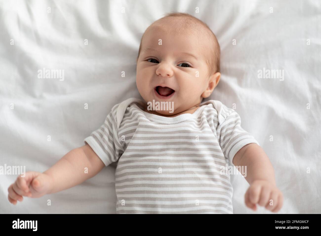 Baby portrait on white head shot hi-res stock photography and images ...