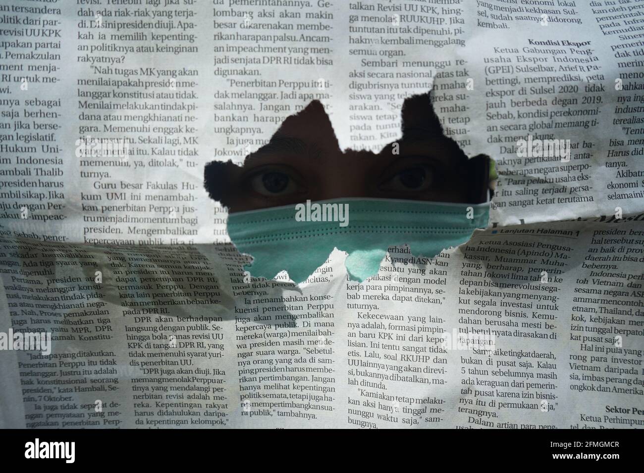 Woman wearing a ripped face mask hi-res stock photography and images ...