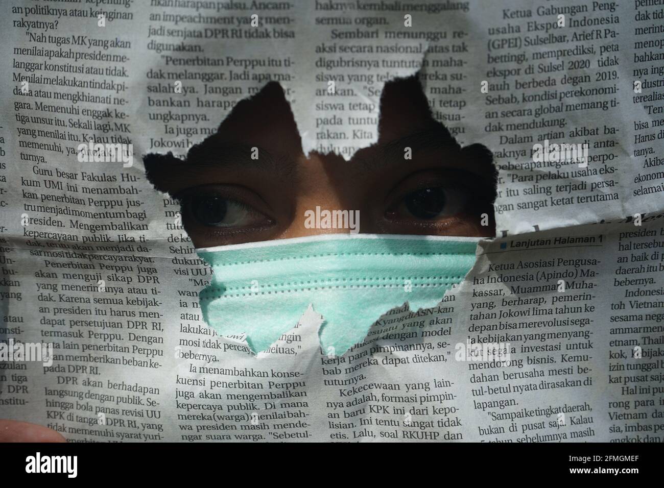 Woman wearing a ripped face mask hi-res stock photography and images ...