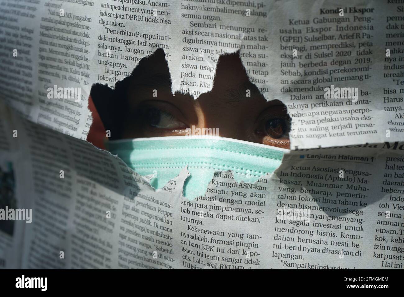 Woman wearing a ripped face mask hi-res stock photography and images ...