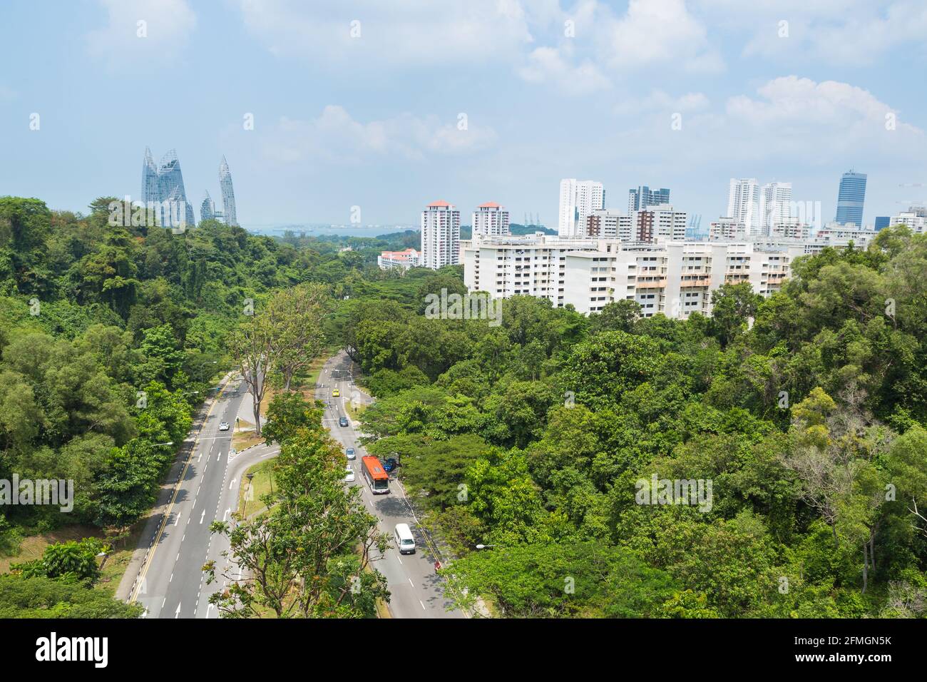 Road Park in Singapore. Road route into town There is a shady tree ...