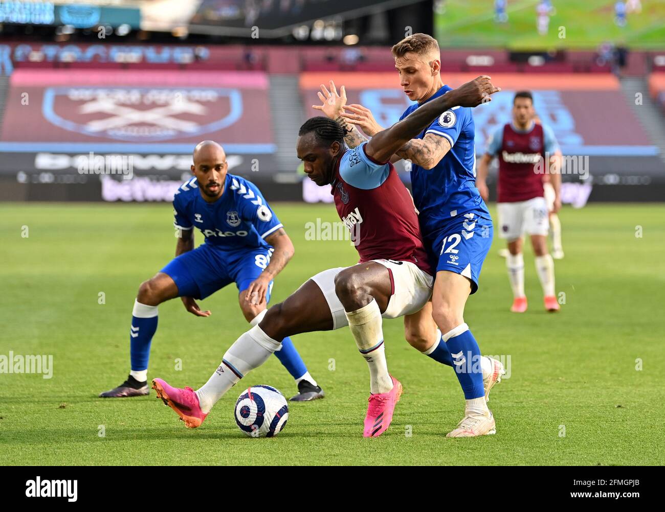 West Ham United's Michail Antonio and Everton's Lucas Digne (right ...