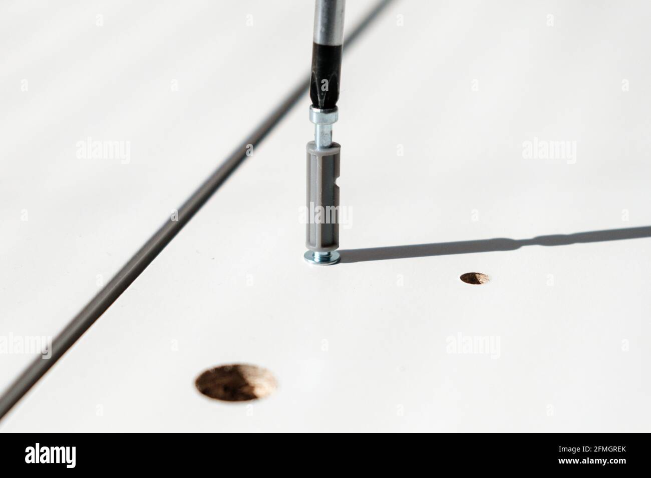 Tightening screw hi-res stock photography and images - Alamy