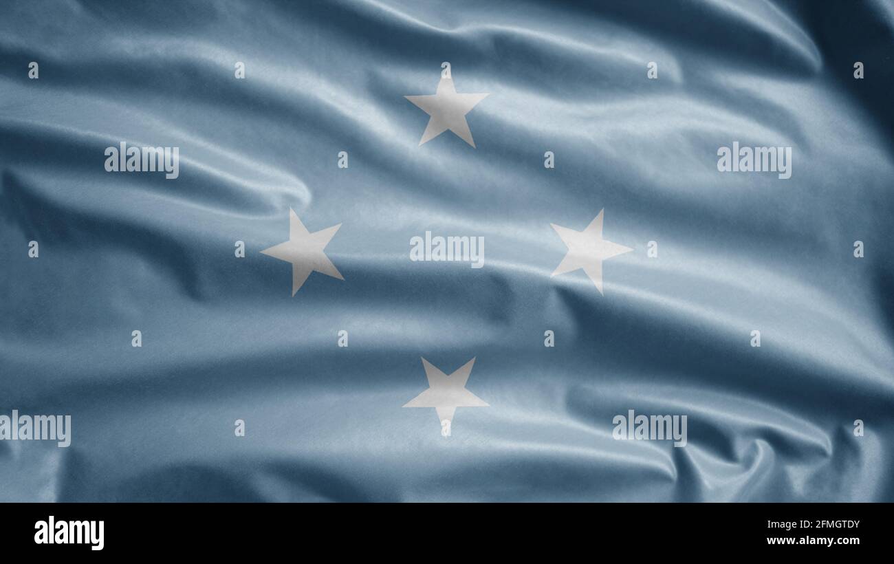 Micronesian flag waving in the wind. Close up of Micronesia banner ...